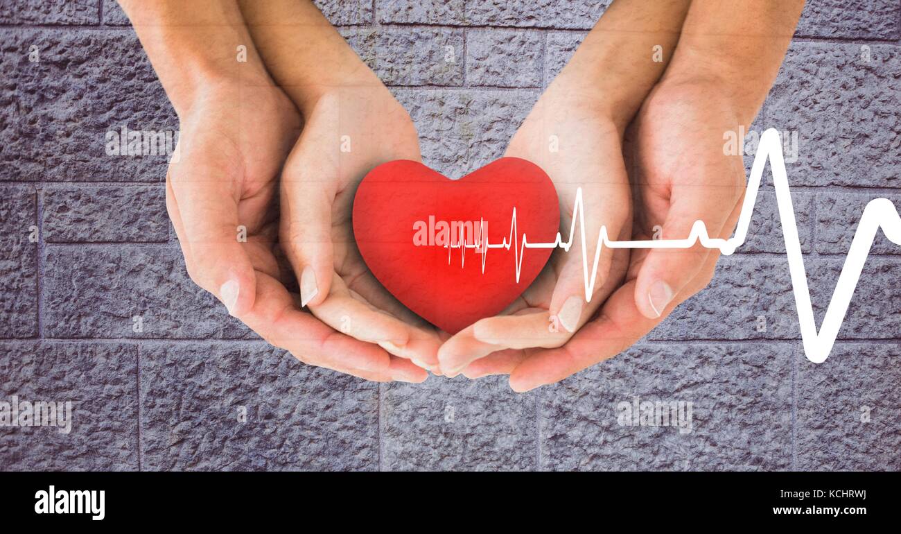 Digital composite of Heart beat over hands holding heart Stock Photo ...