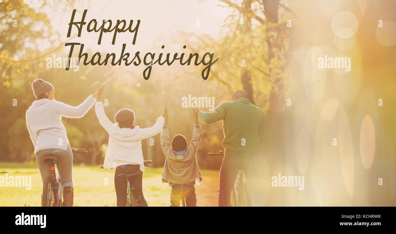 Digital composite of Happy thanksgiving text with family together in ...