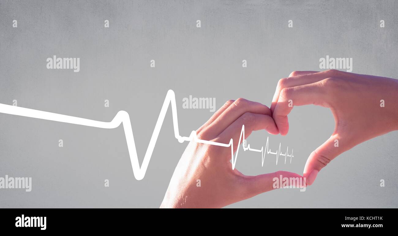 Digital composite of Heart beat over hands holding heart Stock Photo ...