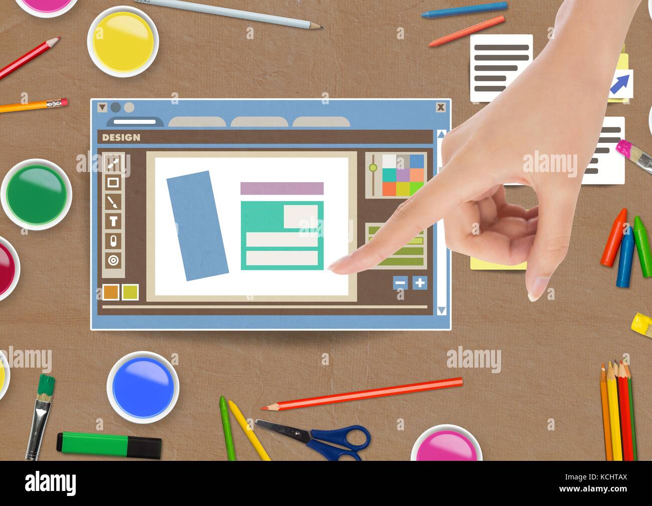 Digital composite of Hand touching Design editor window and creative ...
