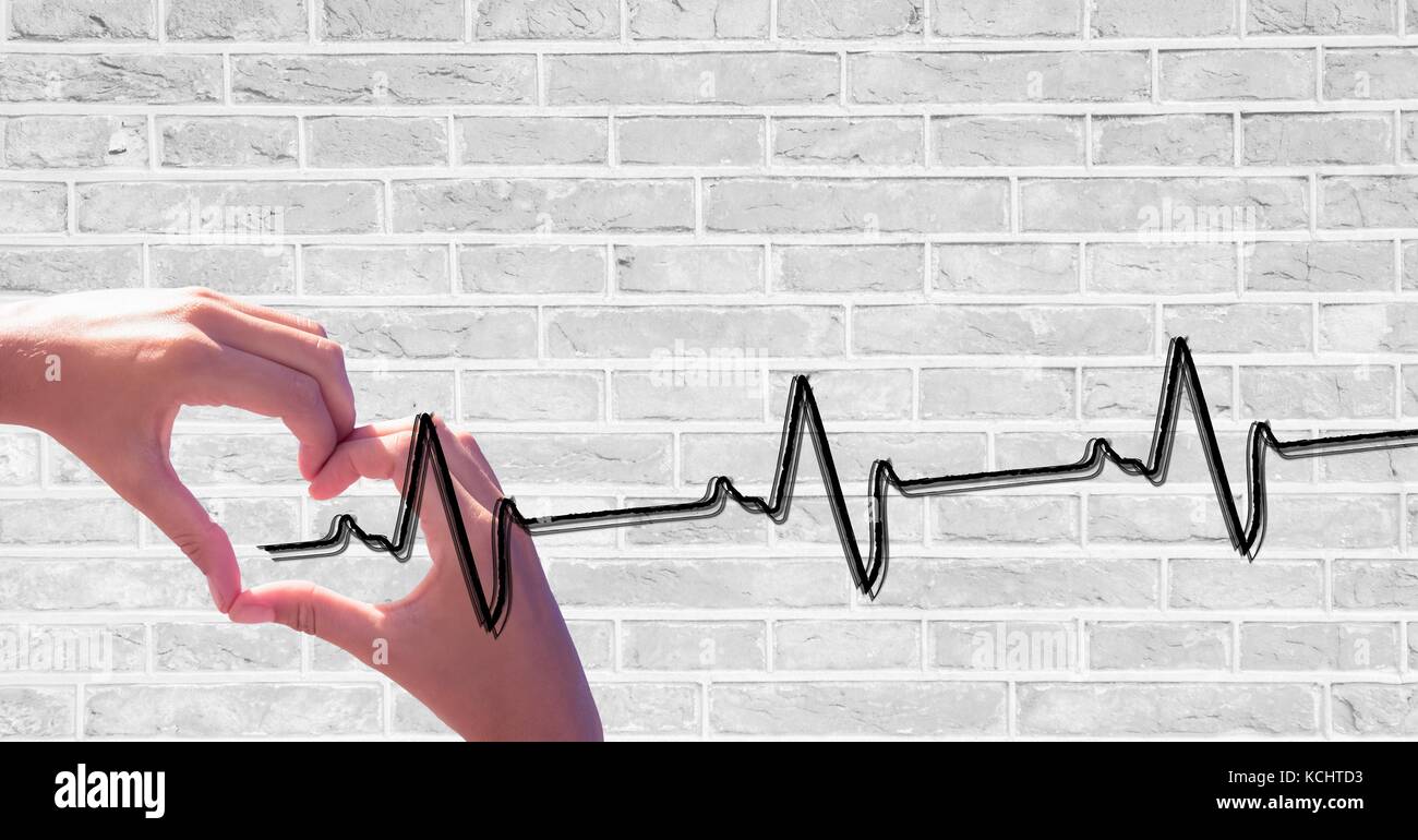 Digital composite of Heart beat over hands holding heart Stock Photo ...