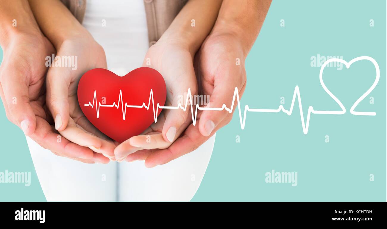 Digital composite of Heart beat over hands holding heart Stock Photo ...