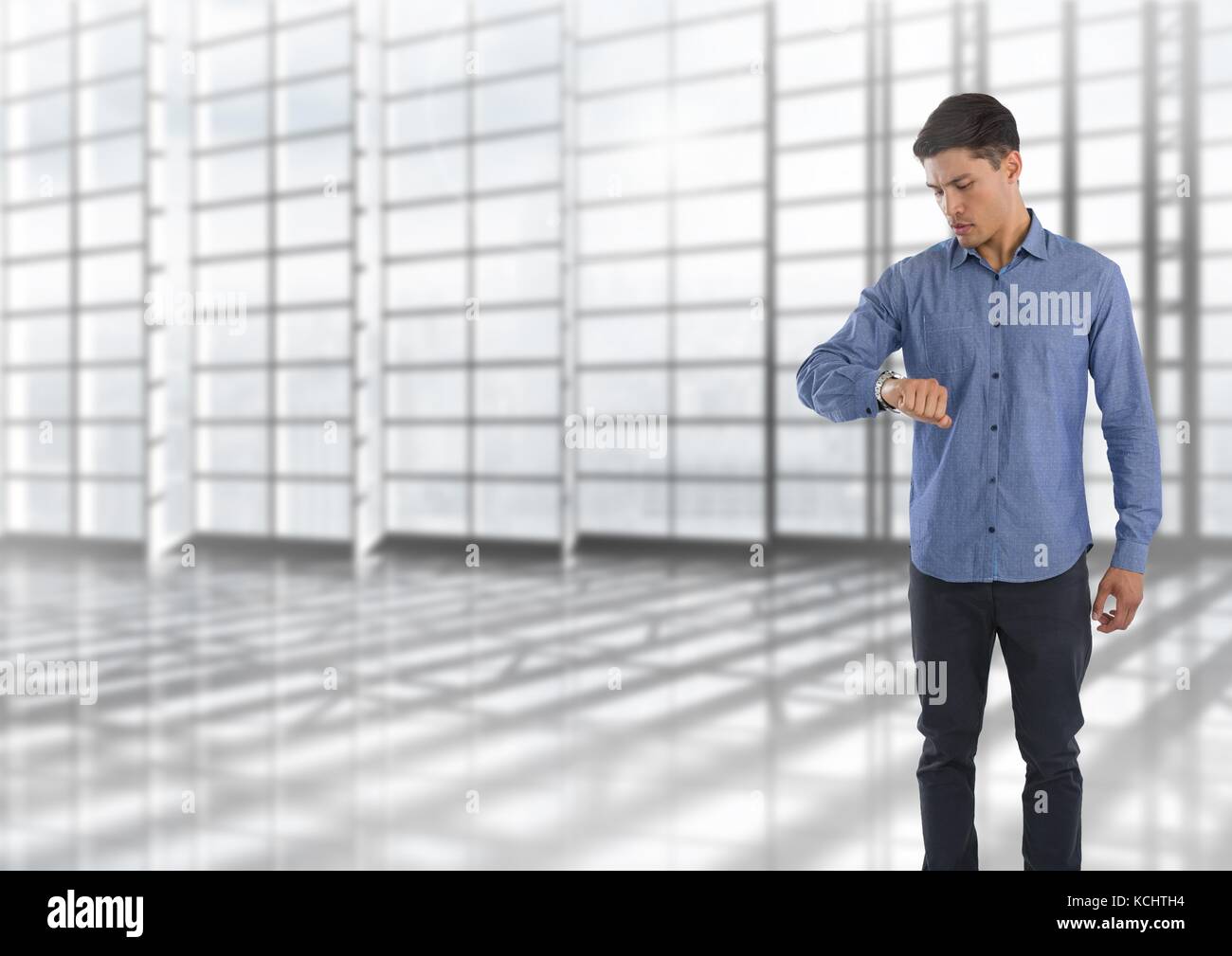 Digital composite of Businessman checking time on watch with large ...