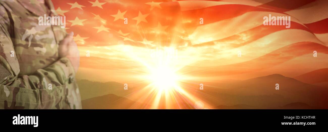 Digital composite of veterans day soldier in front of flag Stock Photo - Alamy