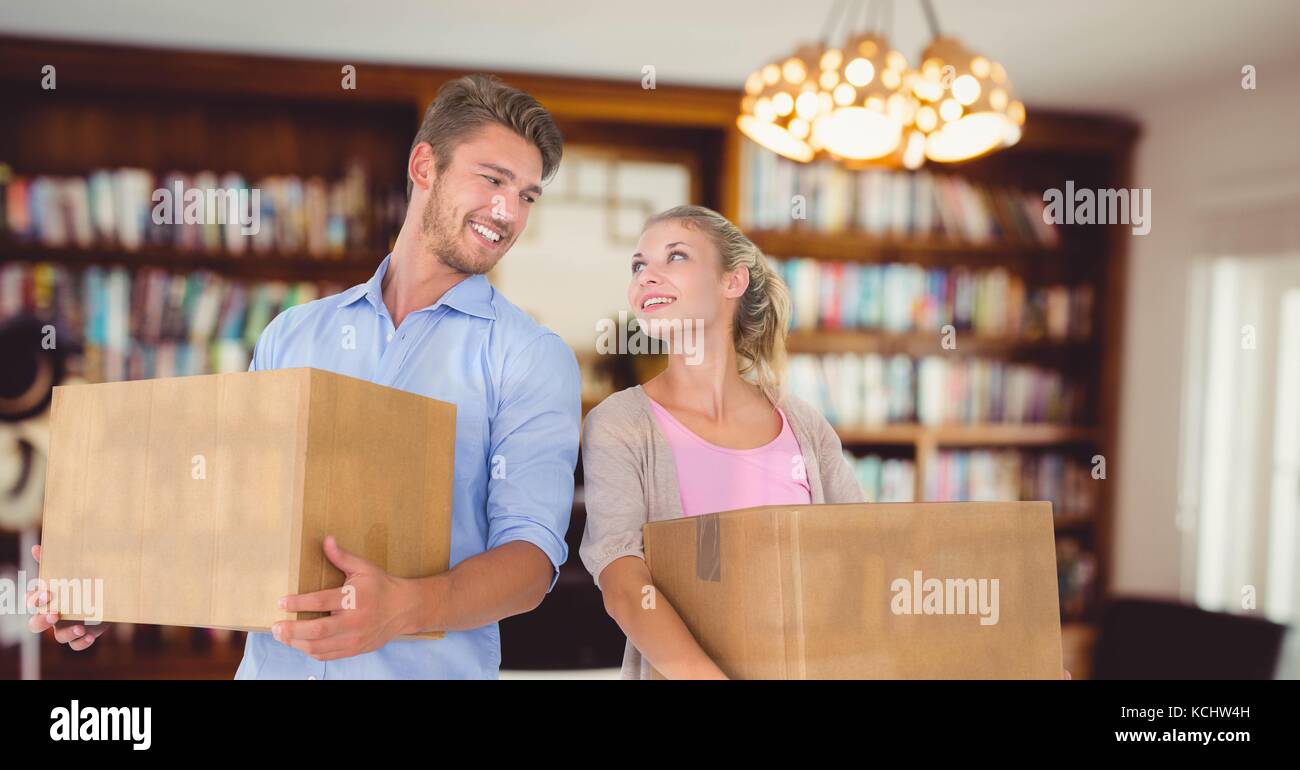 Digital composite of People moving into new home Stock Photo - Alamy