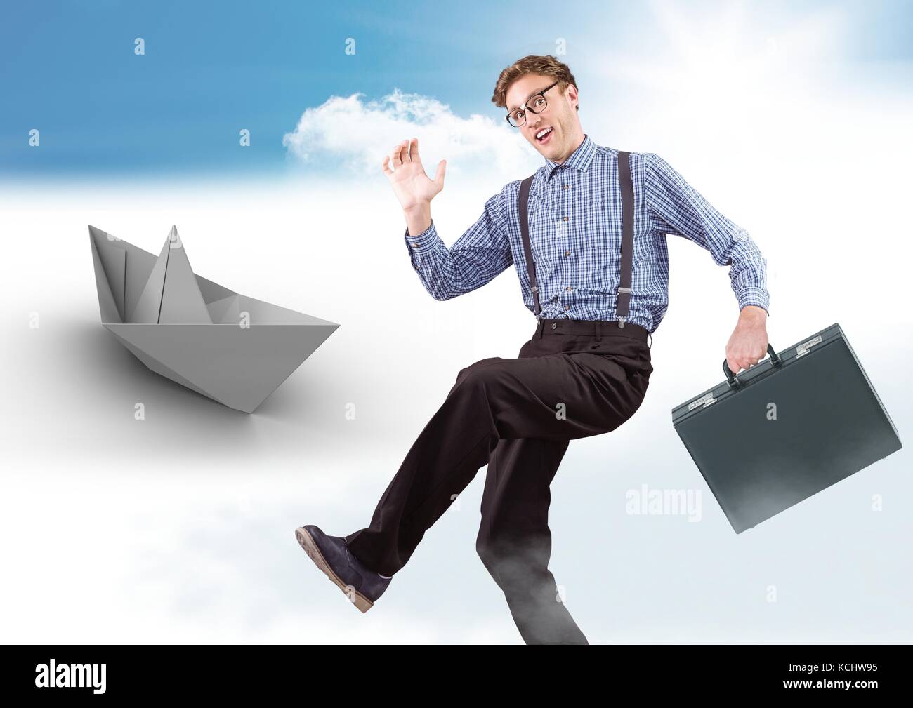 Digital composite of Businessman with briefcase and paper boat in sky ...