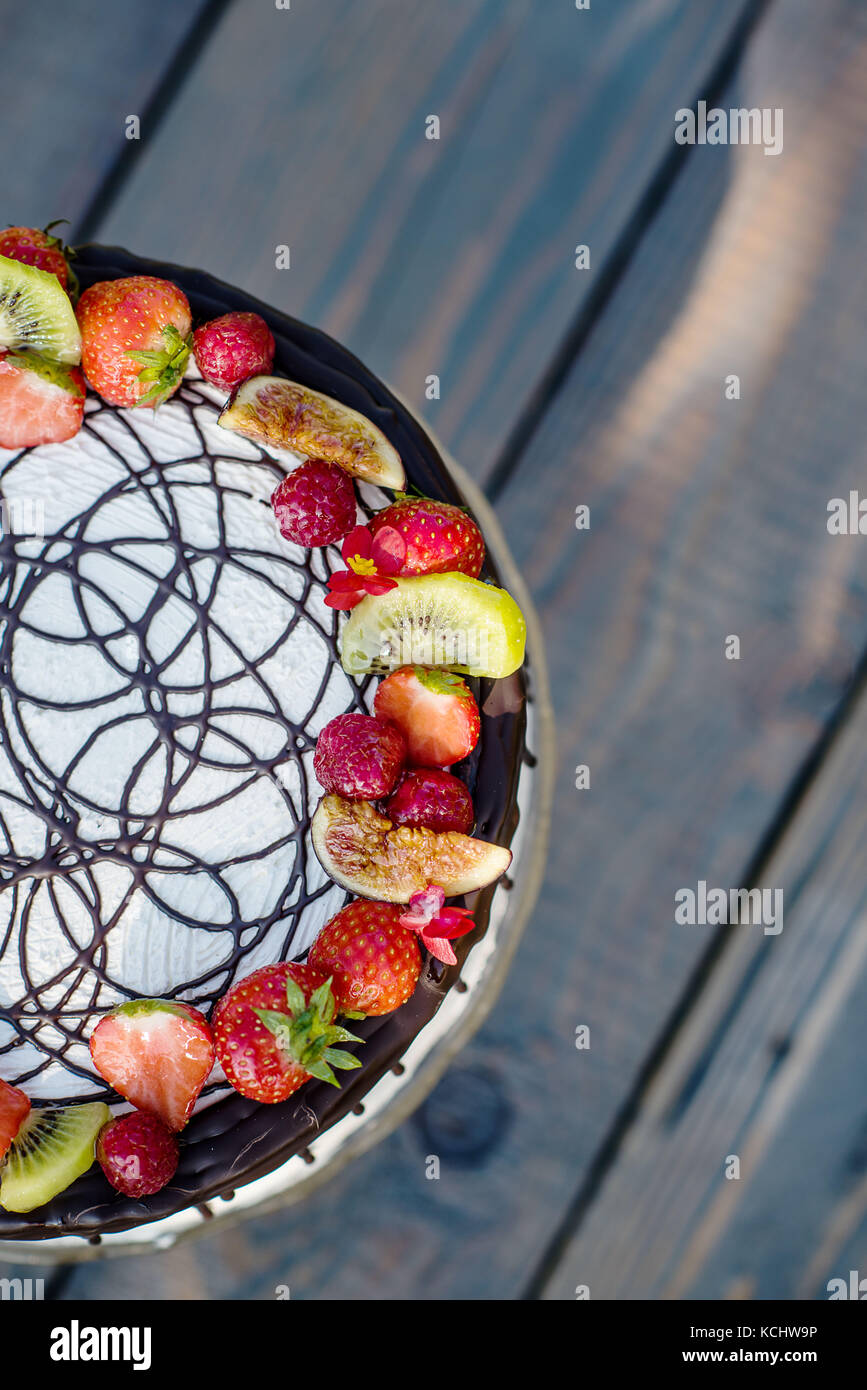 chite cream cake with chocolate and summer fruit Stock Photo - Alamy