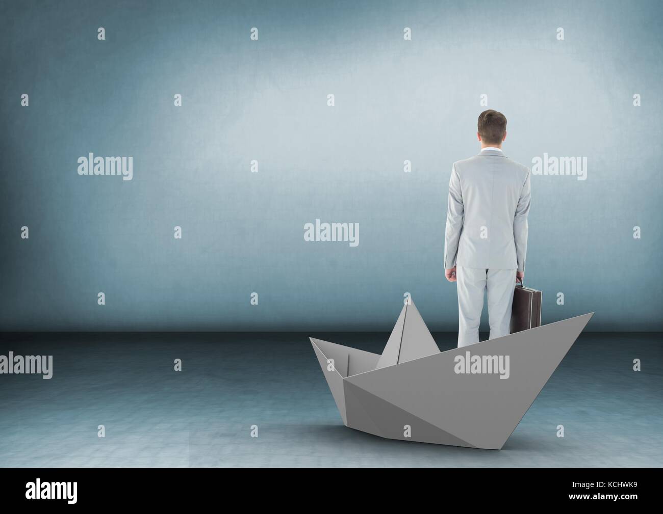 Digital composite of Businessman with briefcase in paper boat Stock ...