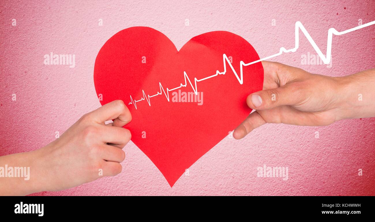 Digital composite of Heart beat over hands holding heart Stock Photo ...