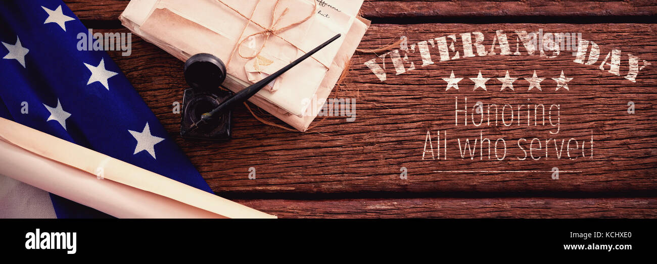 Logo for veterans day in america against american flag with rolled-up ...