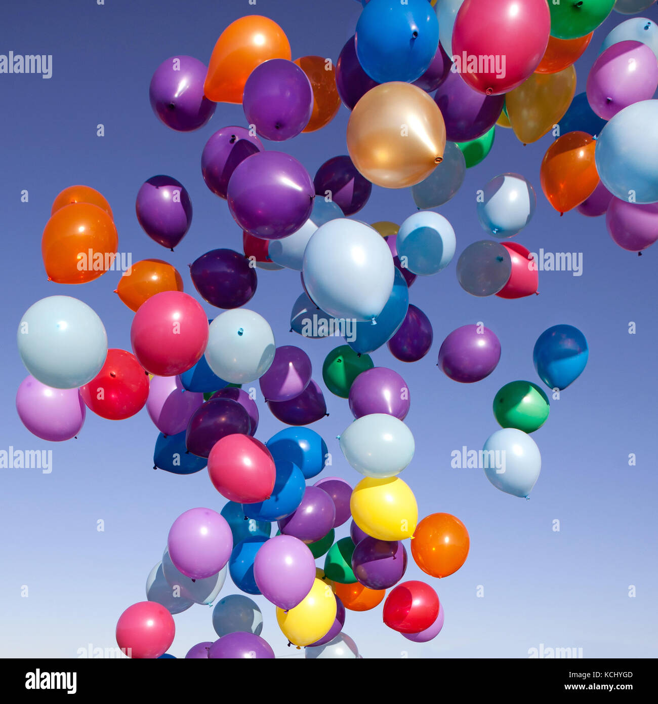 Colorful Balloons flying in the sky party Stock Photo - Alamy