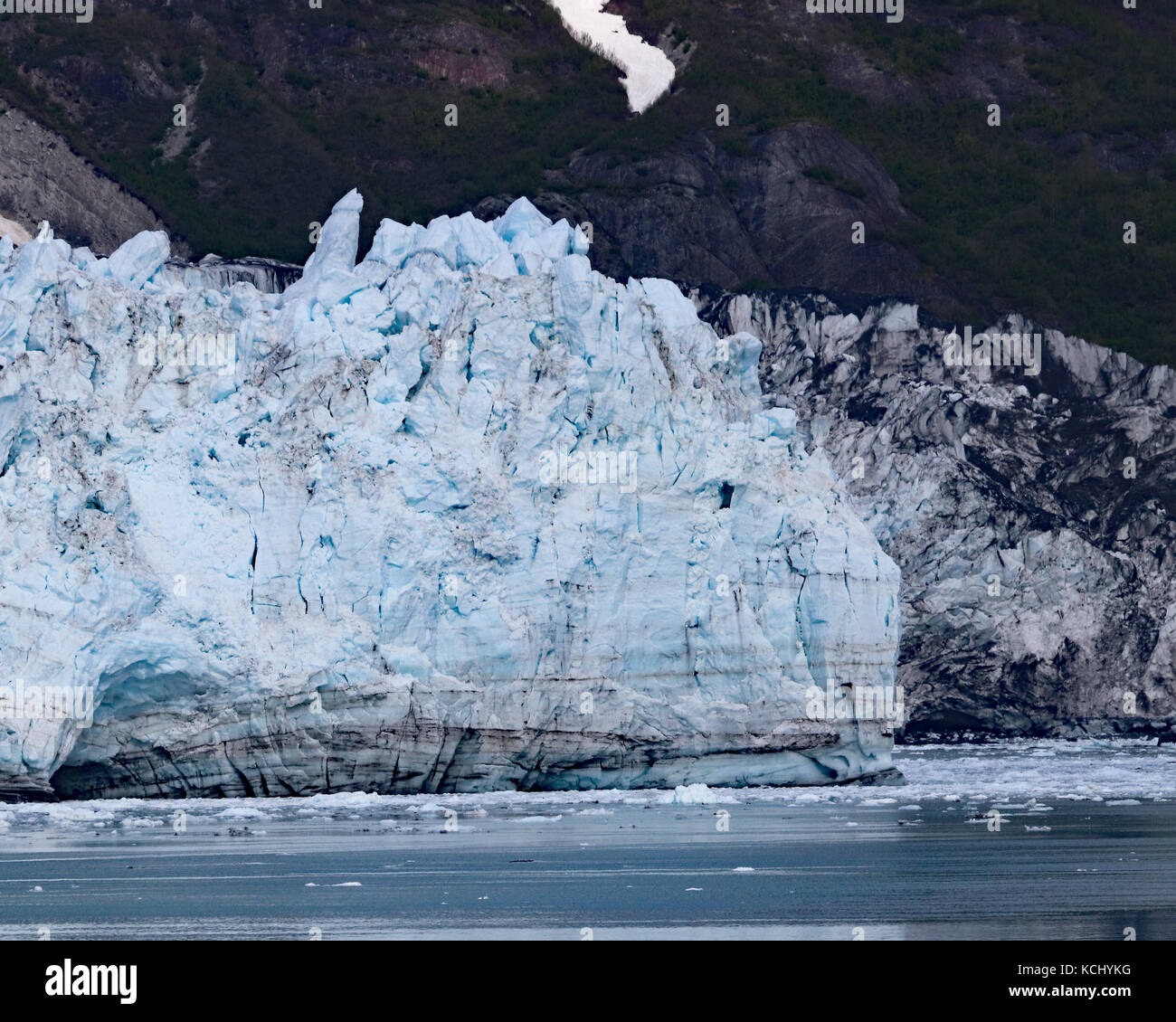 Blue and black details in the ice on Margerie glacier Tarr Inlett ...