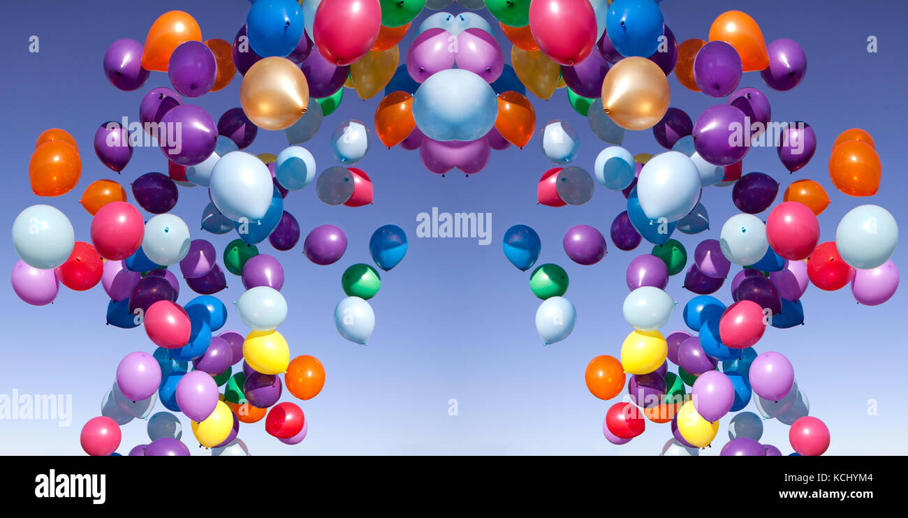 Colorful Balloons flying in the sky party Stock Photo - Alamy