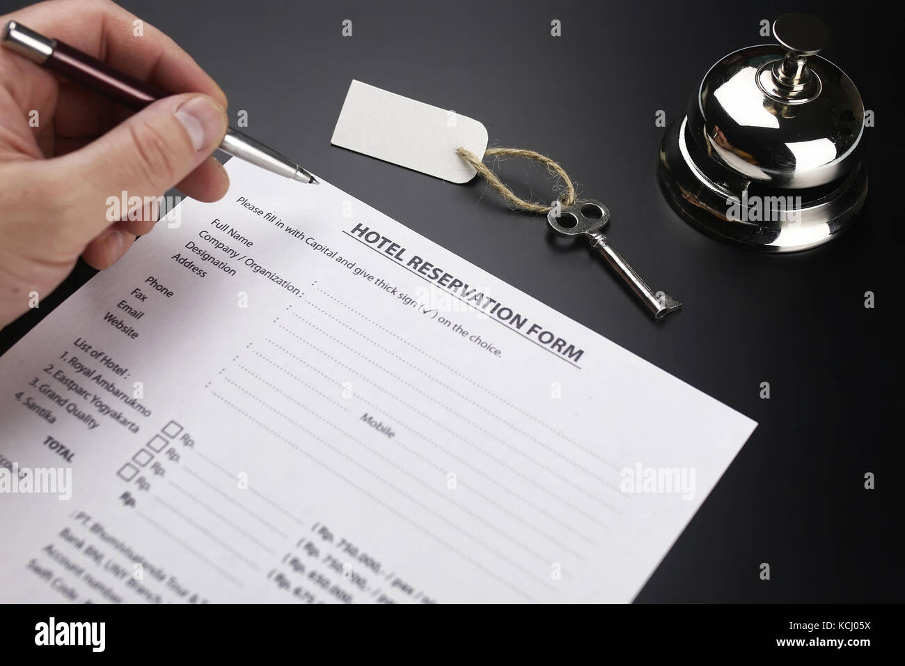bell and the key at the reception in the hotel Stock Photo - Alamy