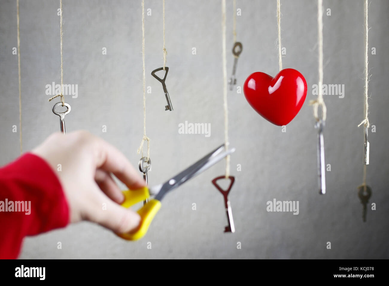 hand stretching for one of the many old vintage keys Stock Photo - Alamy