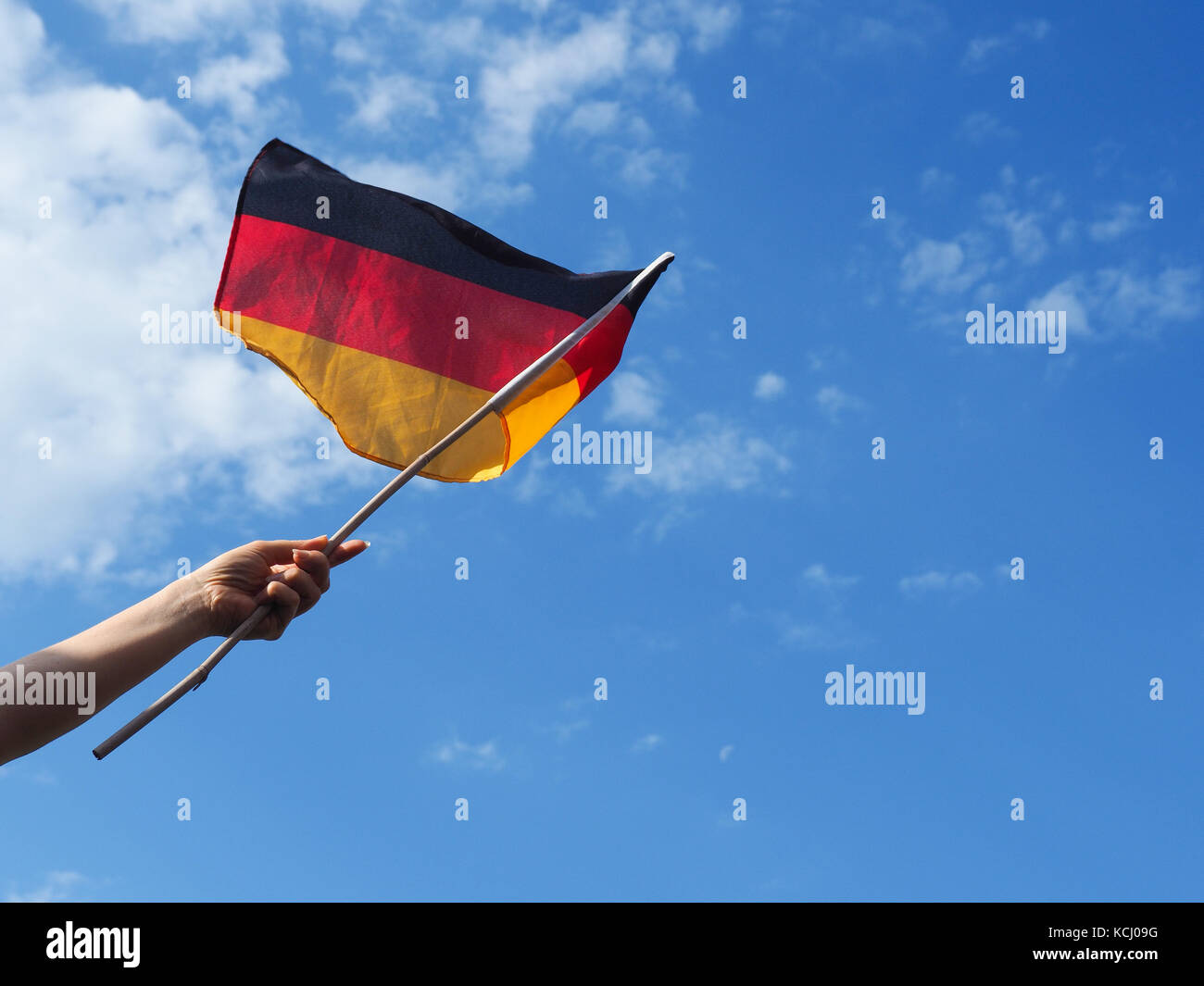 Hand waving hi-res stock photography and images - Alamy
