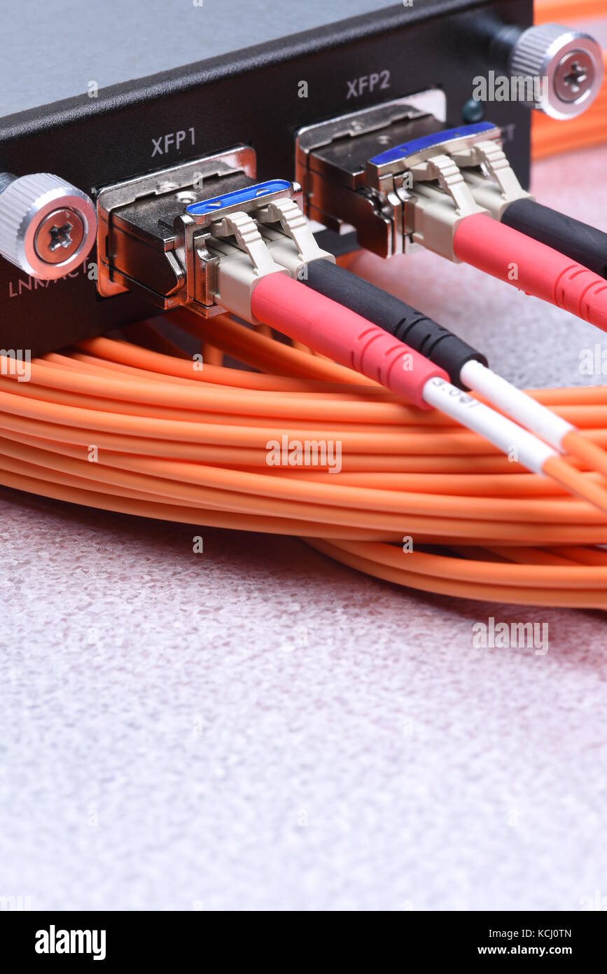 Network optical fiber cables connected to gigabit interface converter ...