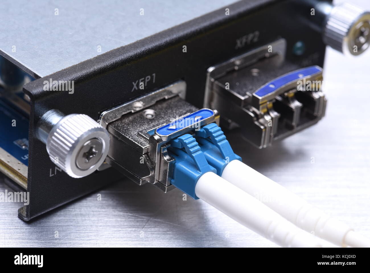 Network optical fiber cables connected to gigabit interface converter ...