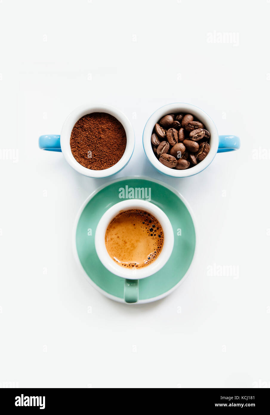 Three cups of coffee: ground coffee (powder), coffee beans and freshly ...