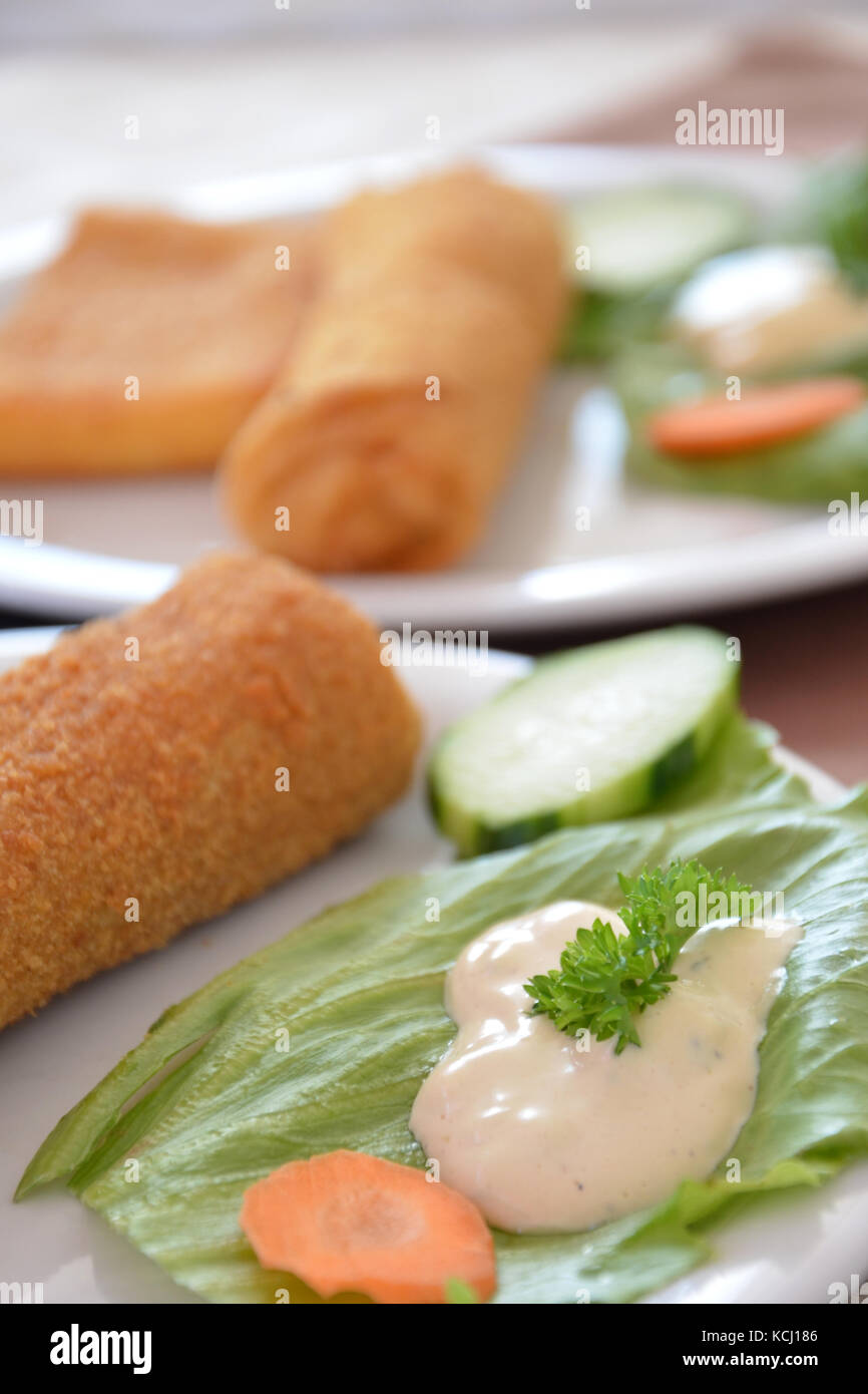 Picture of a Rolled , roasted filled cheese Stock Photo - Alamy