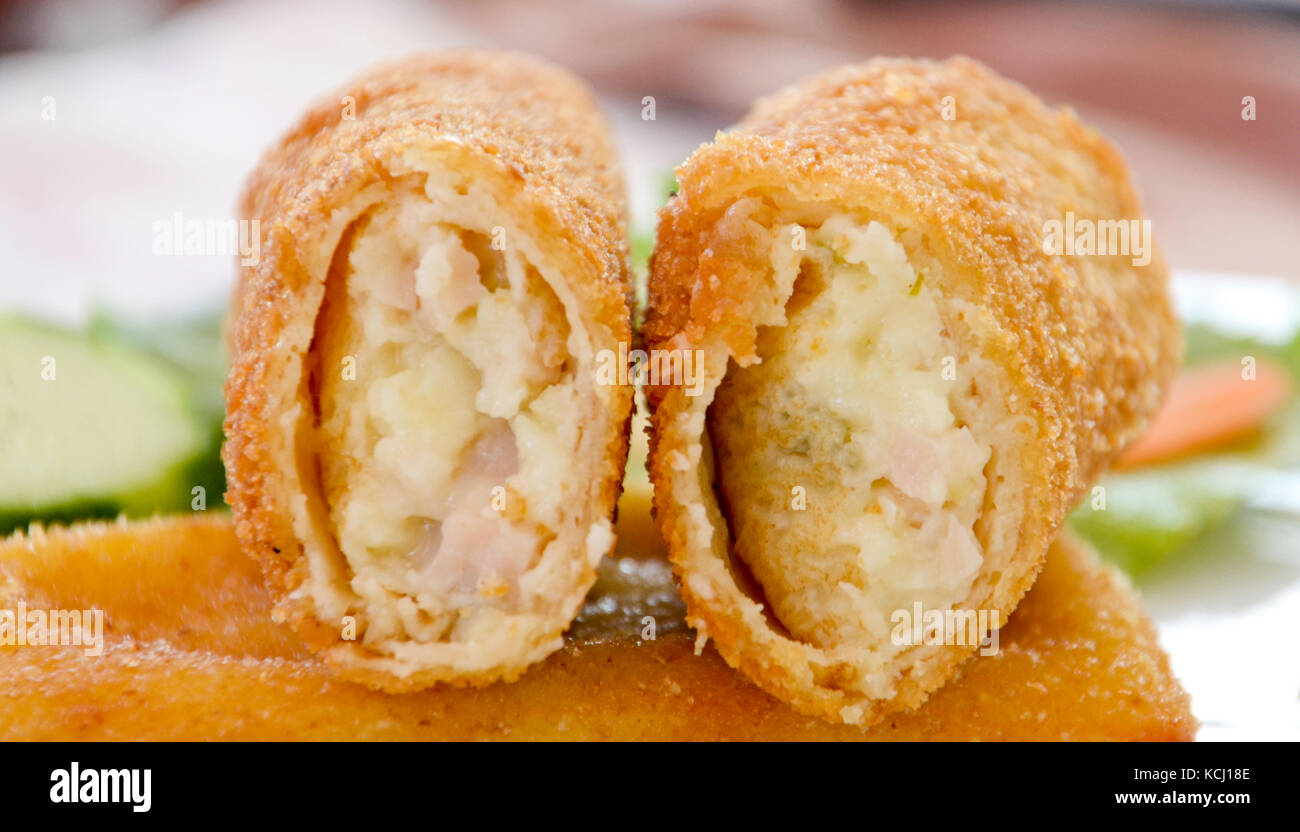 Picture of a Rolled , roasted filled cheese Stock Photo - Alamy