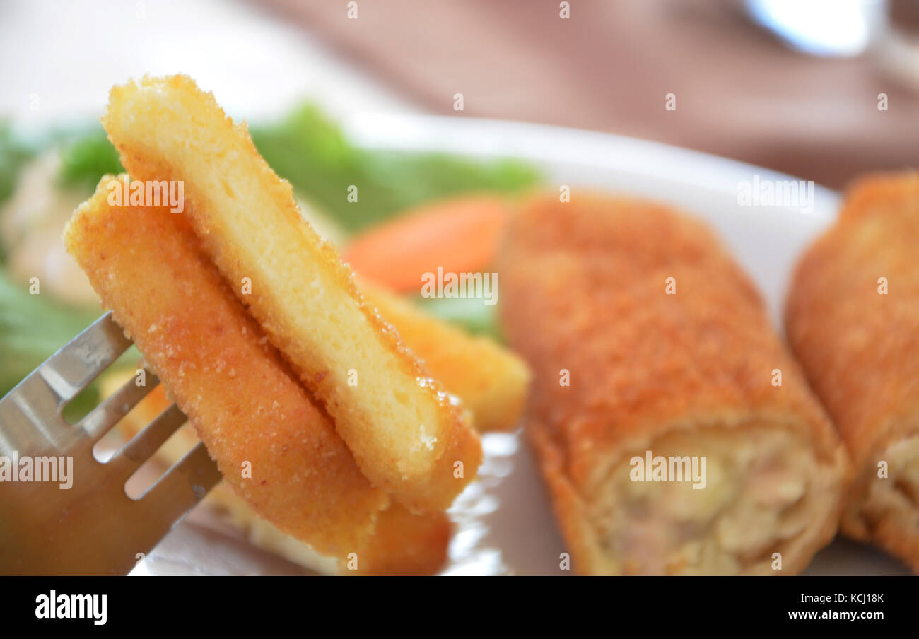 Picture of a Rolled , roasted filled cheese Stock Photo - Alamy