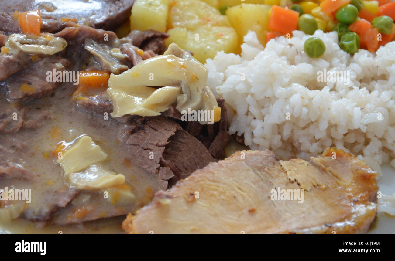 picture of a delicious gourmet food ,meat with garnish Stock Photo - Alamy
