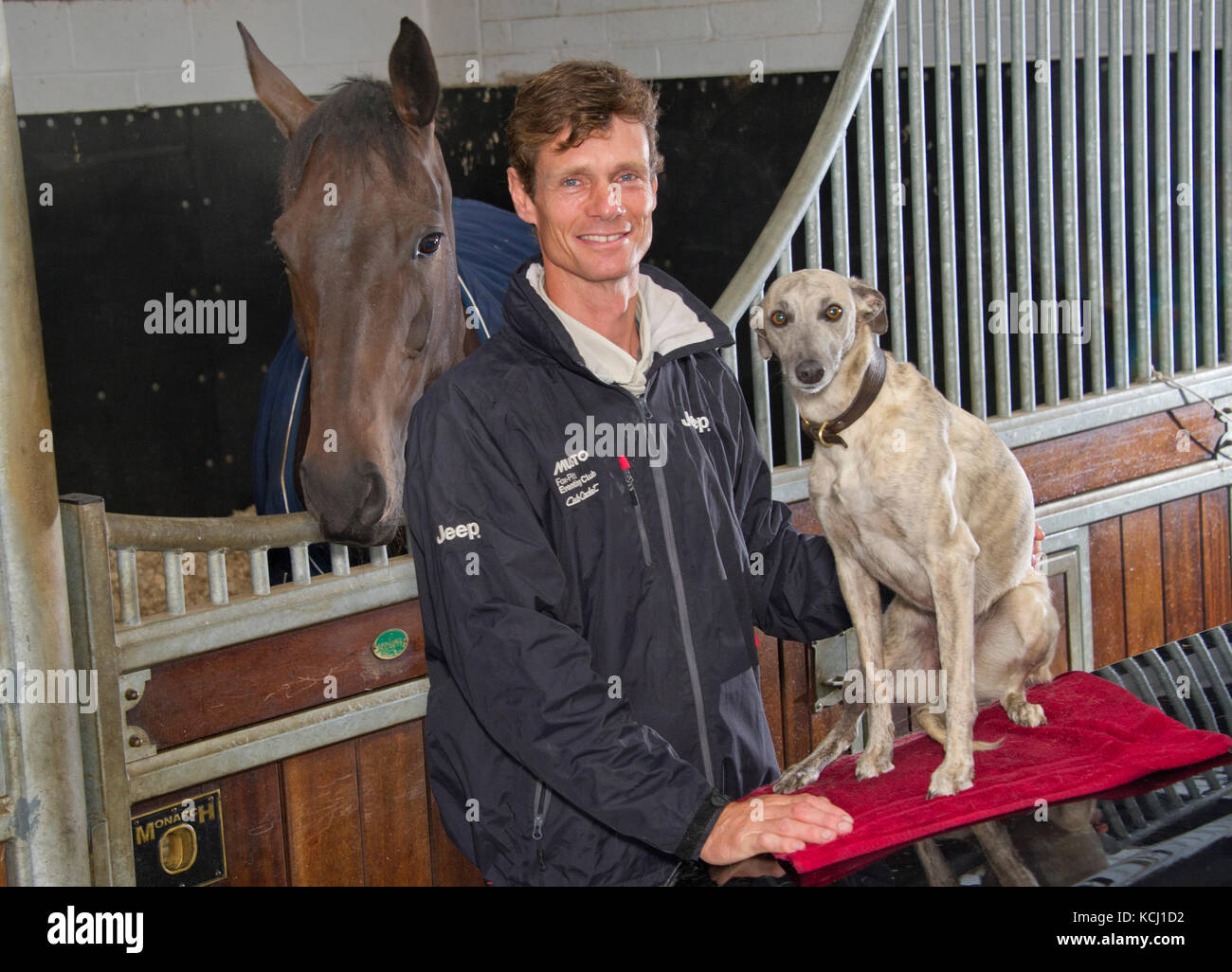 Equestrian William Fox-Pitt with his dog 'Poppy' Stock Photo - Alamy