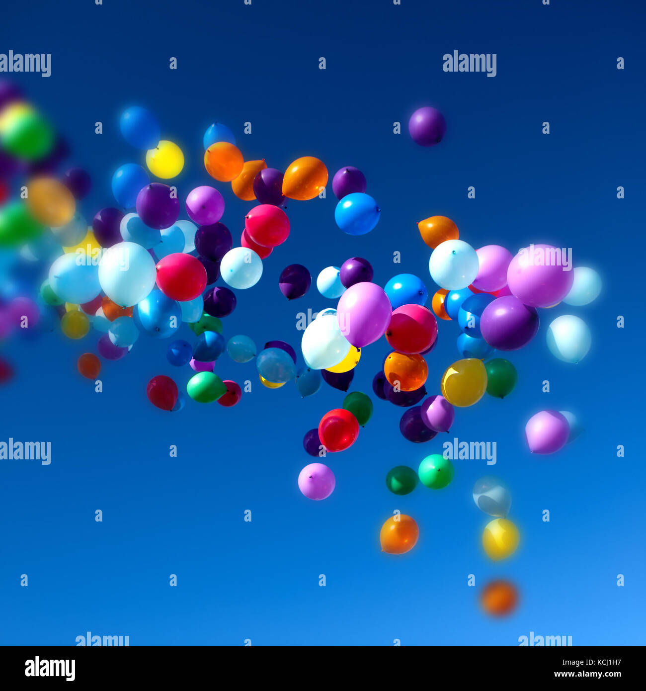 Festive balloons flying in sky hi-res stock photography and images - Alamy