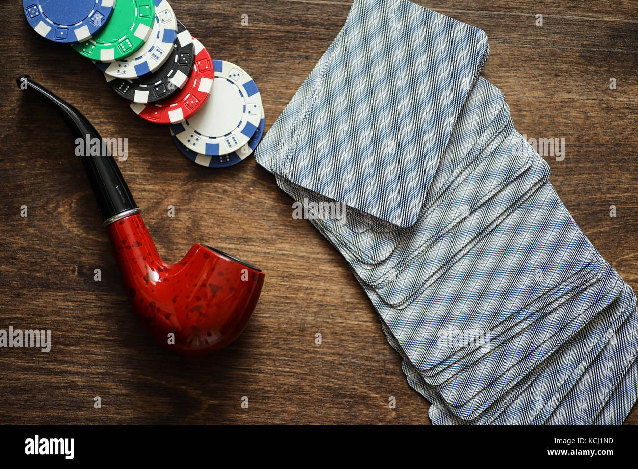 Playing chips and a deck of cards Stock Photo - Alamy