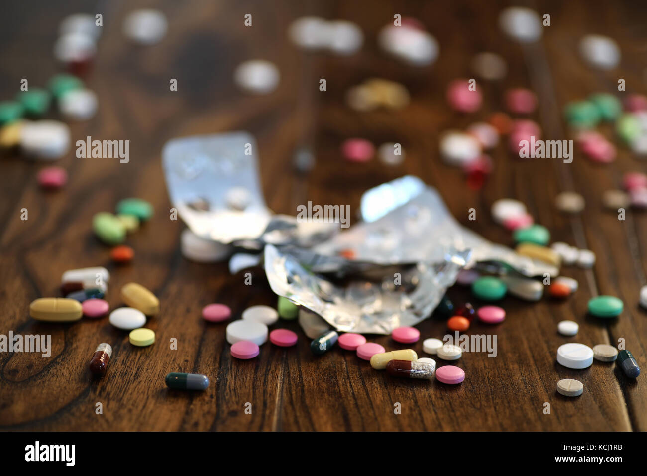 Multicolored tablets of different shapes and sizes Stock Photo - Alamy