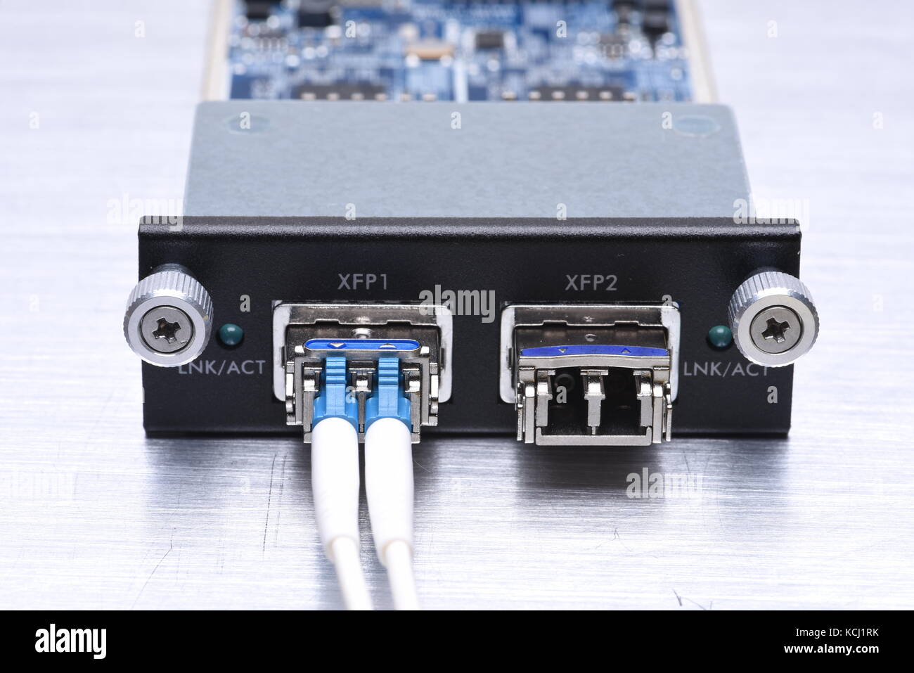 Gigabit interface converter with optical network cables on metal grey ...