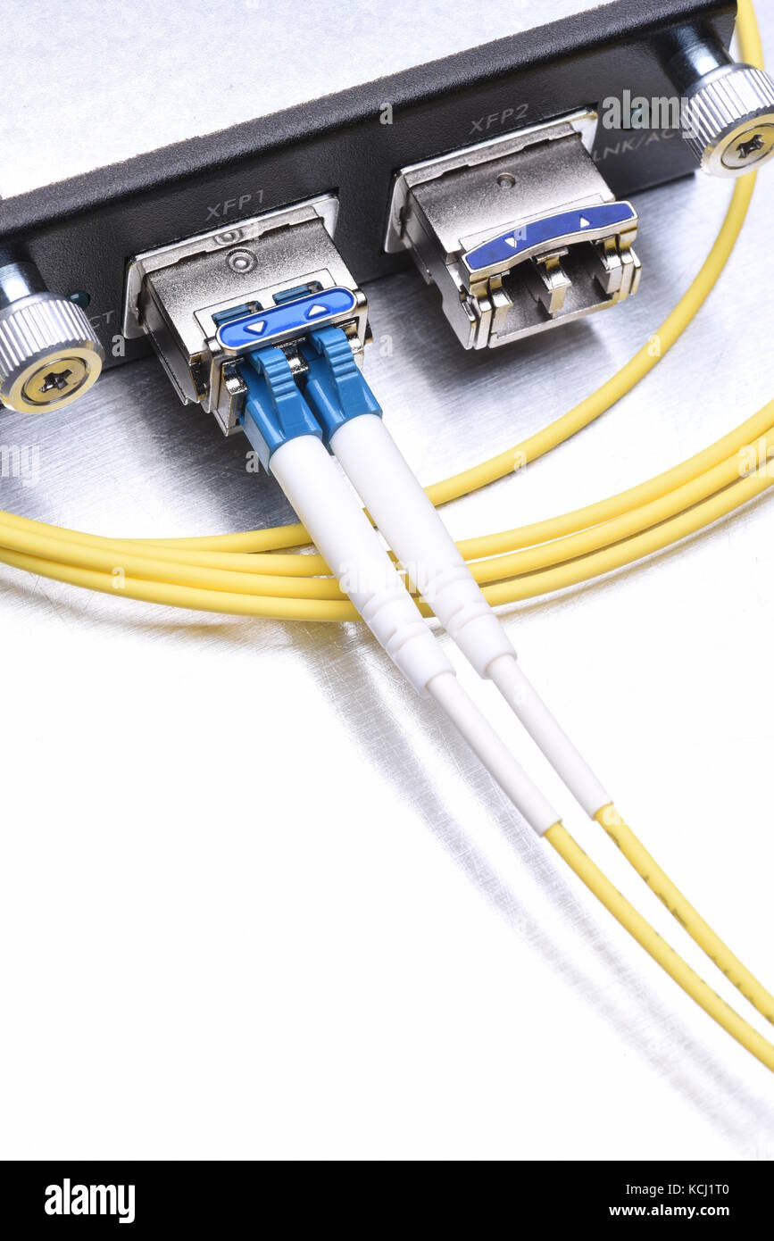 Gigabit interface converter type XFP with optical network cables on ...