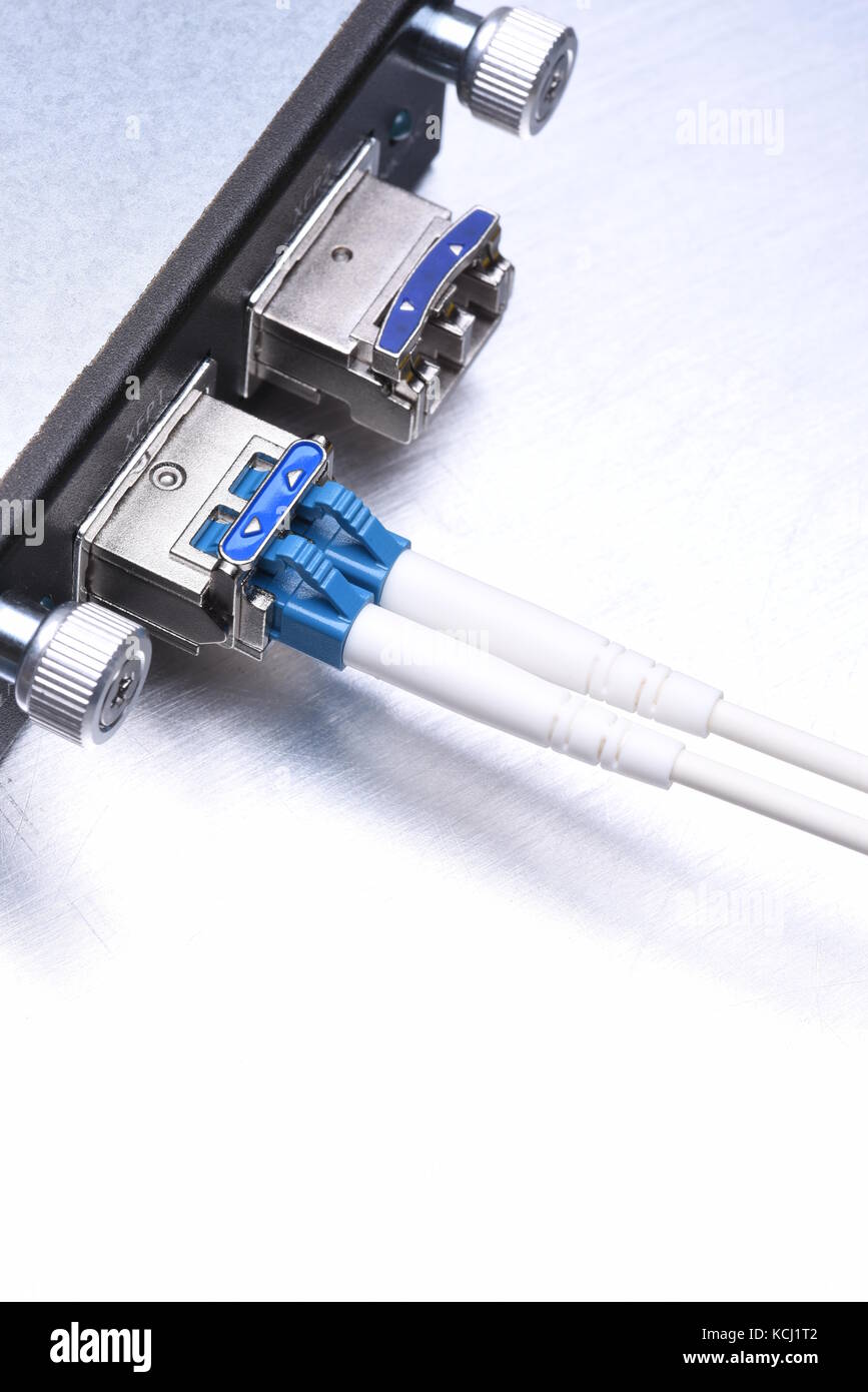 Gigabit interface converter type XFP with optical network cables on ...