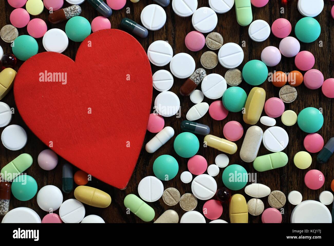 Multicolored tablets of different shapes and sizes Stock Photo - Alamy
