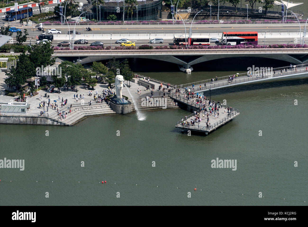 The Merlion spouting water on the Marina Bay waterfront Promenade in ...