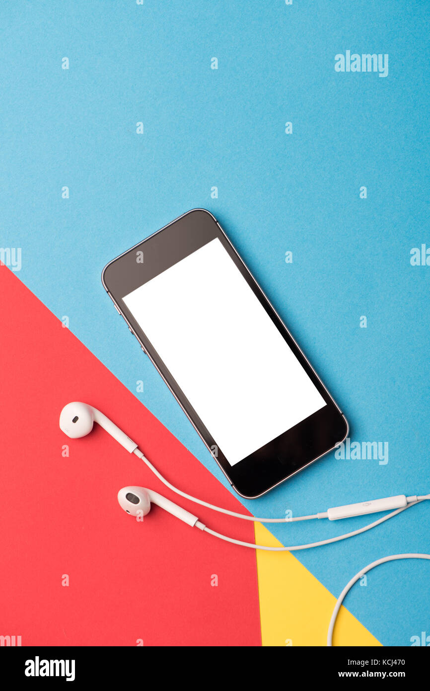 Mobile on colorful paper Stock Photo - Alamy