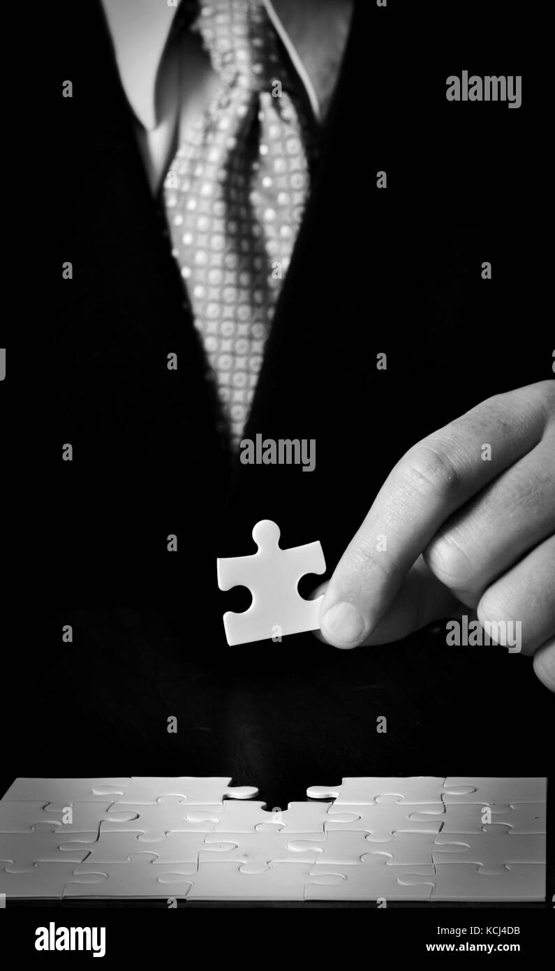 Businessman problem solving Black and White Stock Photos & Images - Alamy