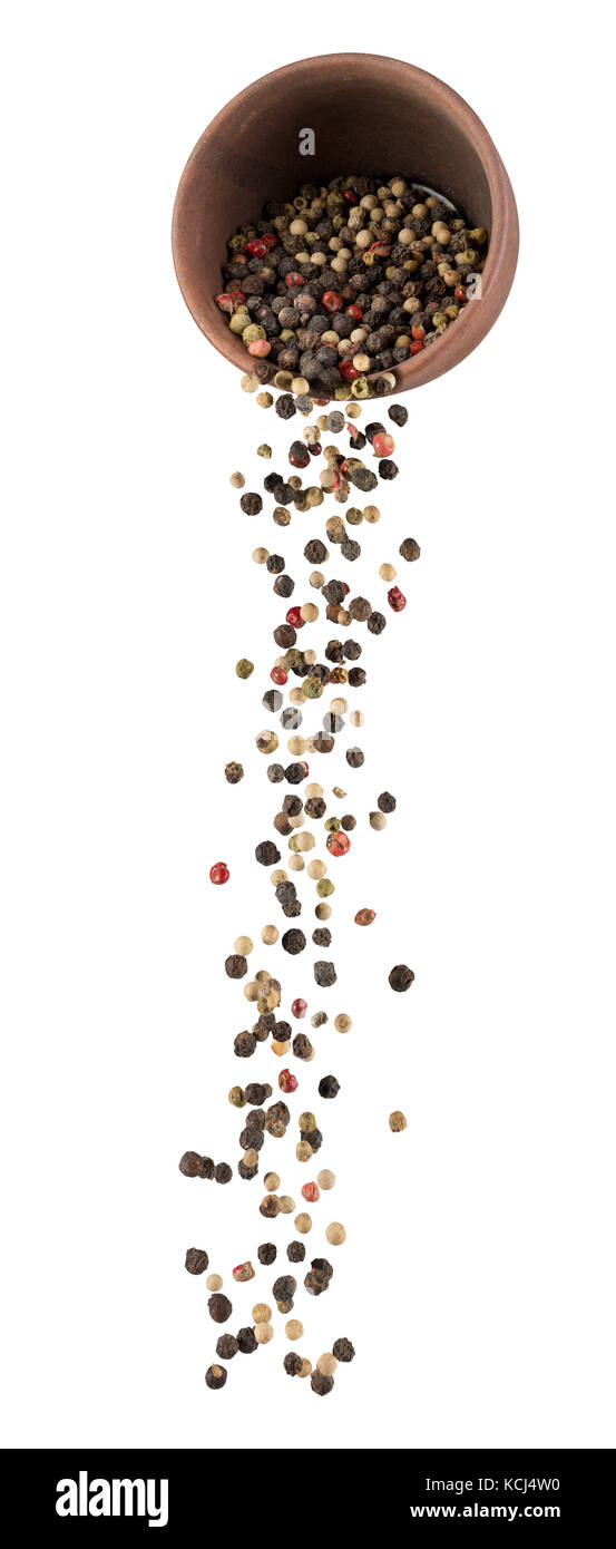 falling pepper peas isolated on a white background Stock Photo - Alamy