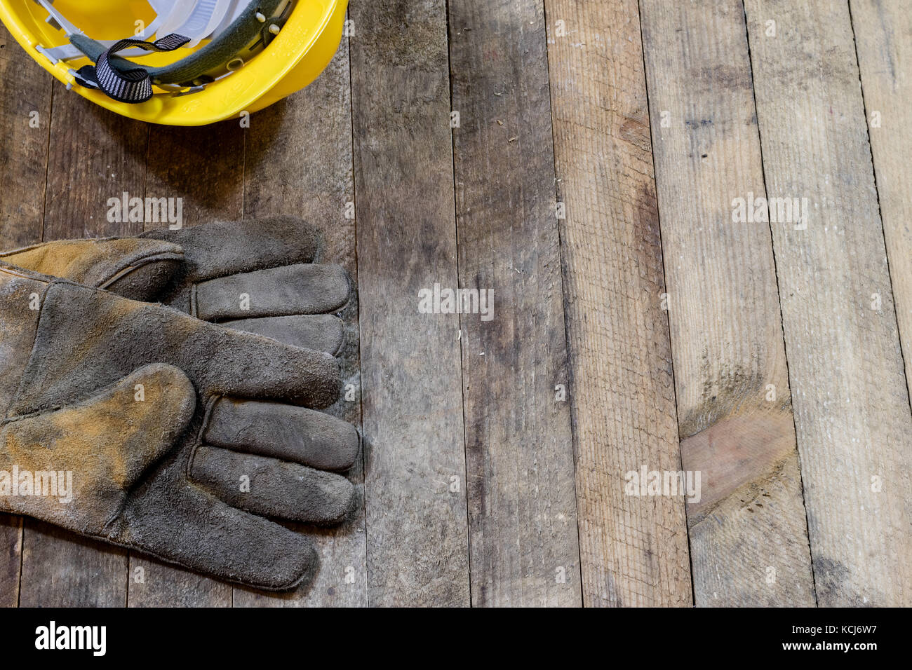 Tools on a wooden table in an old workshop. Arranged on the edge of the ...
