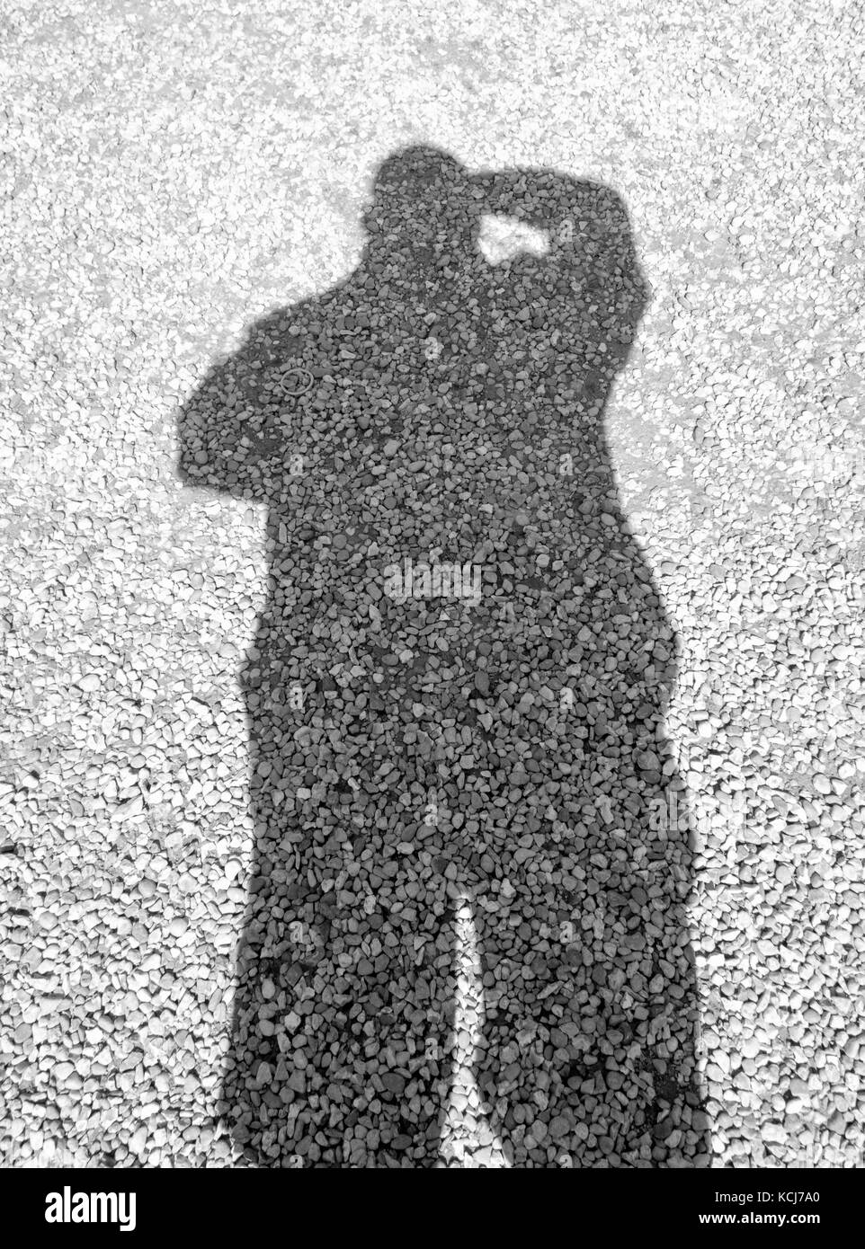 Self portrait in shadow Stock Photo - Alamy
