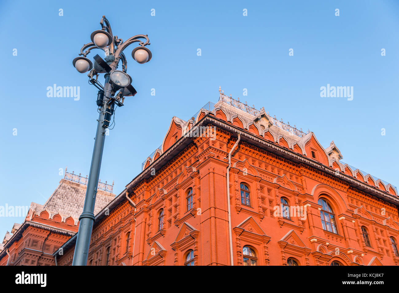 Light post and old orange building called State Historical Museum of ...