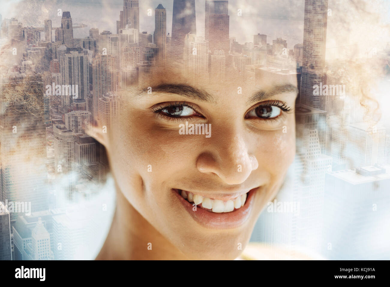 Pretty smiling girl expressing happiness and pleasure Stock Photo - Alamy