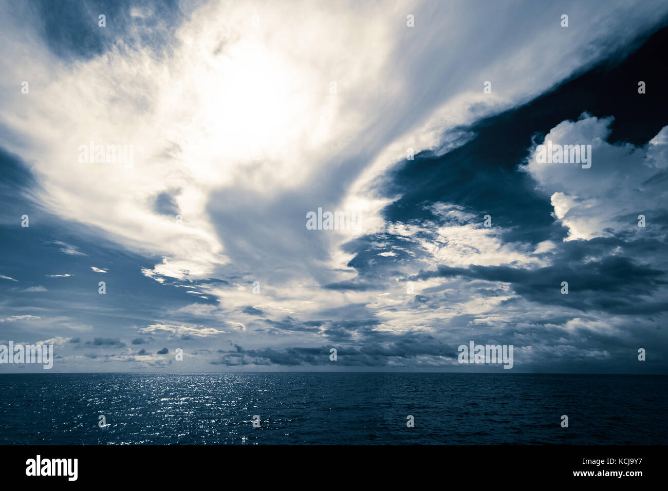 Open ocean and cloudy sky Stock Photo - Alamy