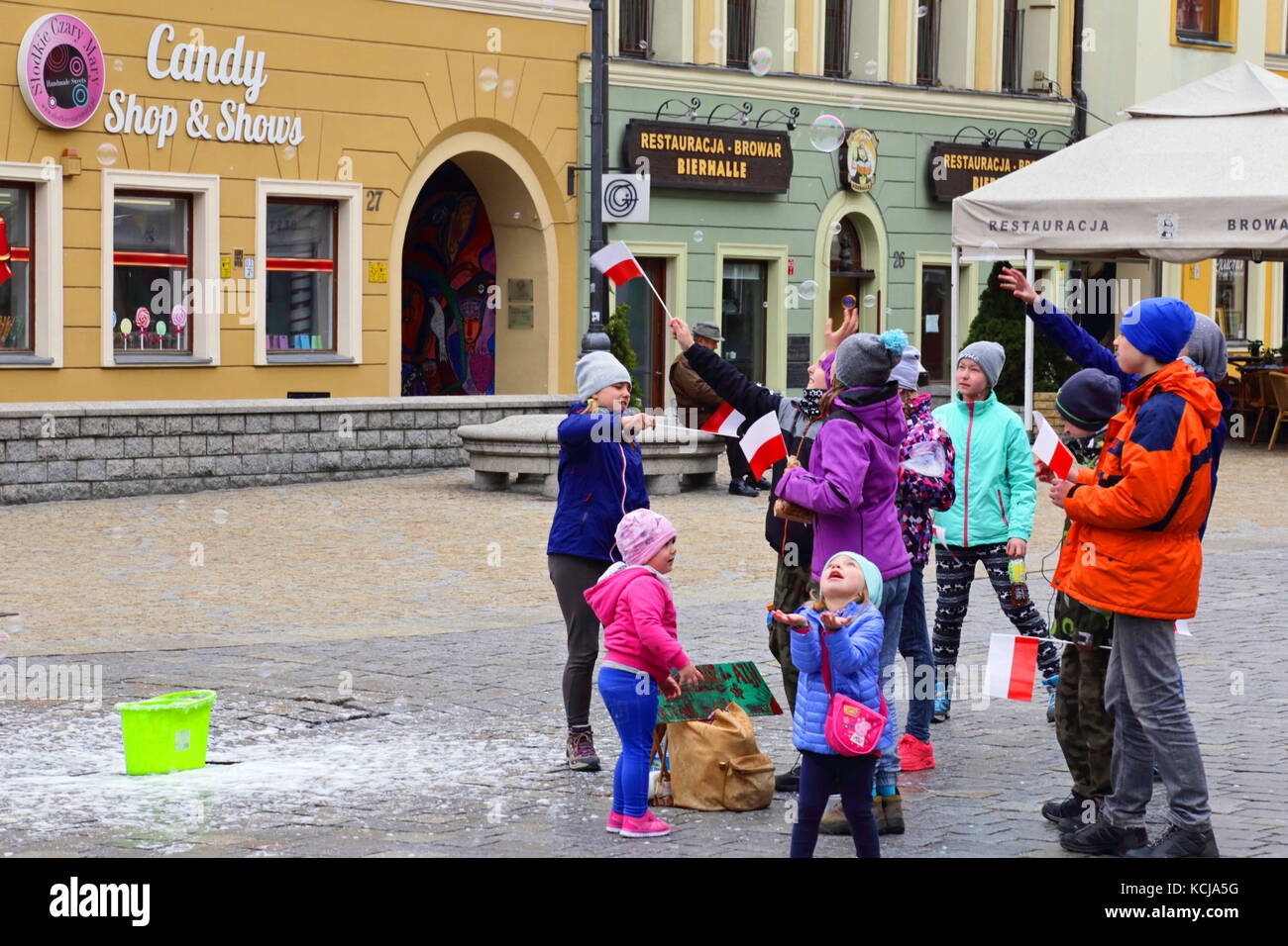 Children enjoying soap bubbles spectacle in Wroclaw, Poland Stock Photo ...