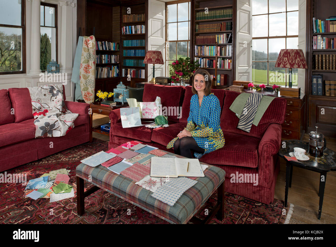 Interior Designer, Sarah Fortescue in her office, the library of ...