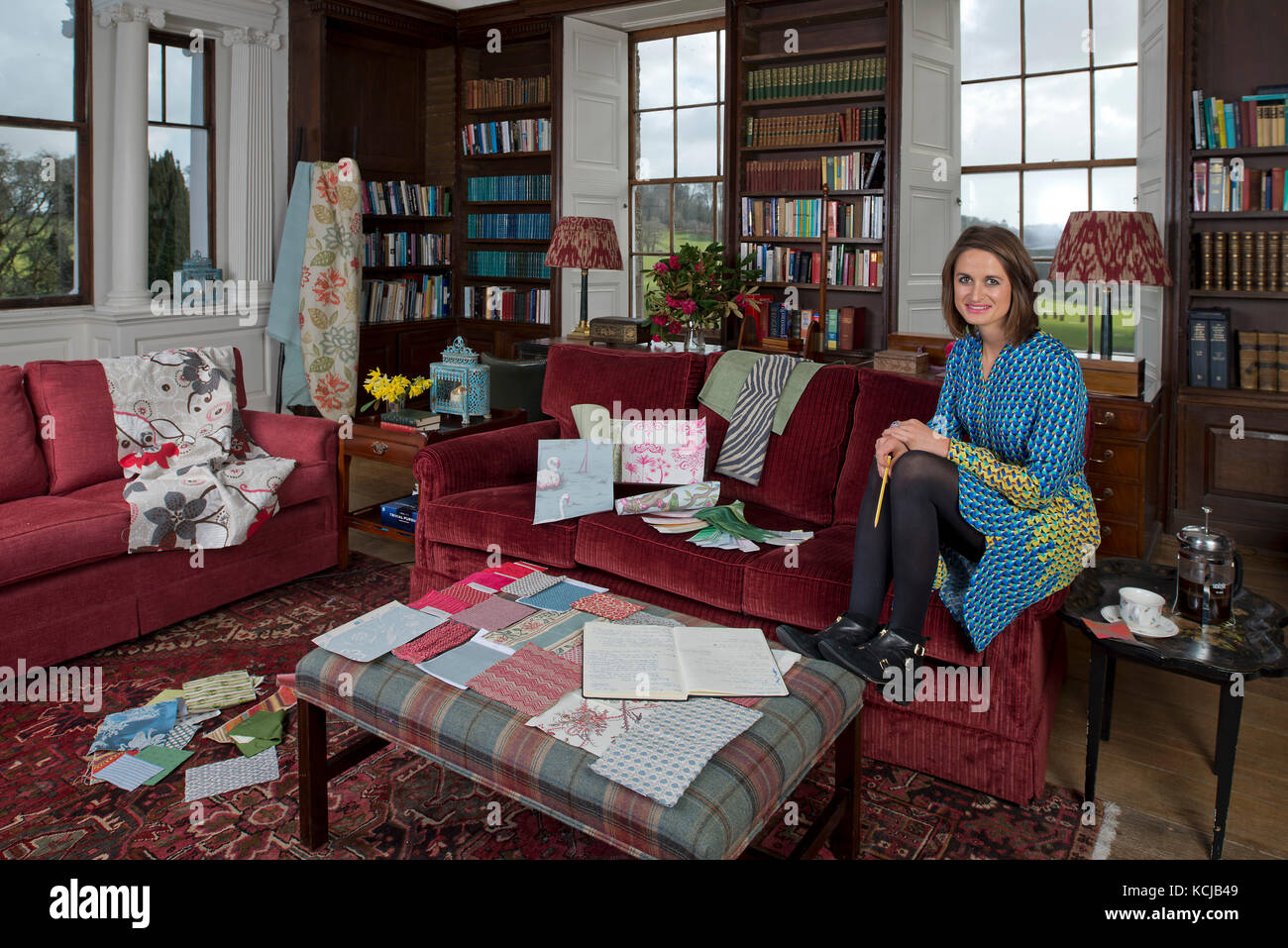 Interior Designer, Sarah Fortescue in her office, the library of ...