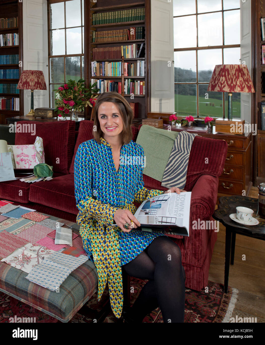 Interior Designer, Sarah Fortescue in her office, the library of ...