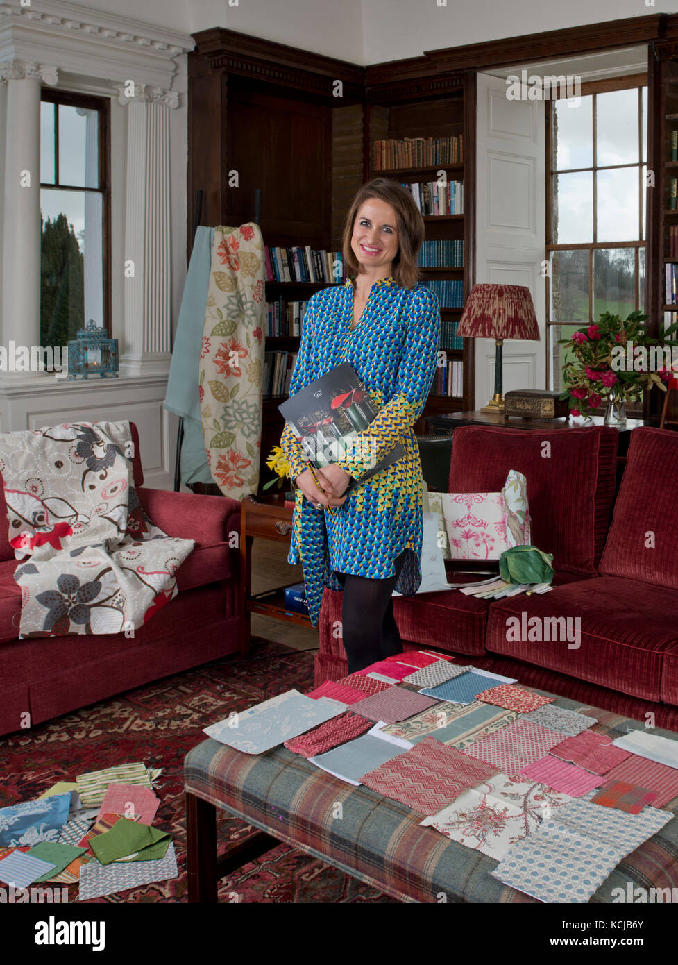 Interior Designer, Sarah Fortescue in her office, the library of ...