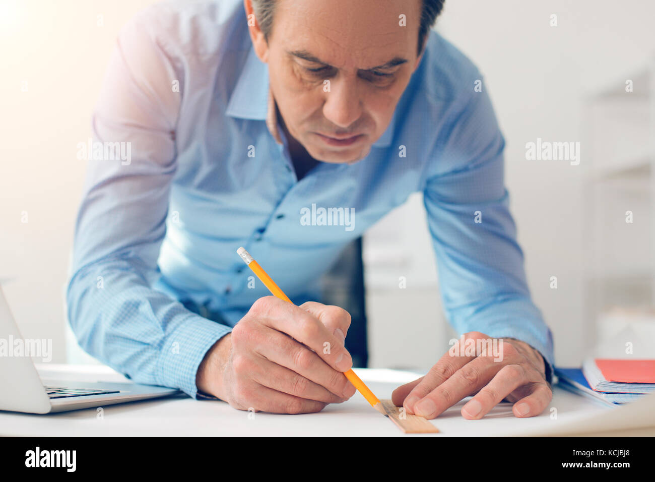 Skillful professional engineer drawing Stock Photo - Alamy